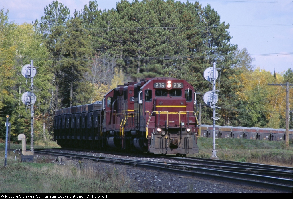 DMIR 206 212 haul another loaded T-bird for the Fairlane Plant,